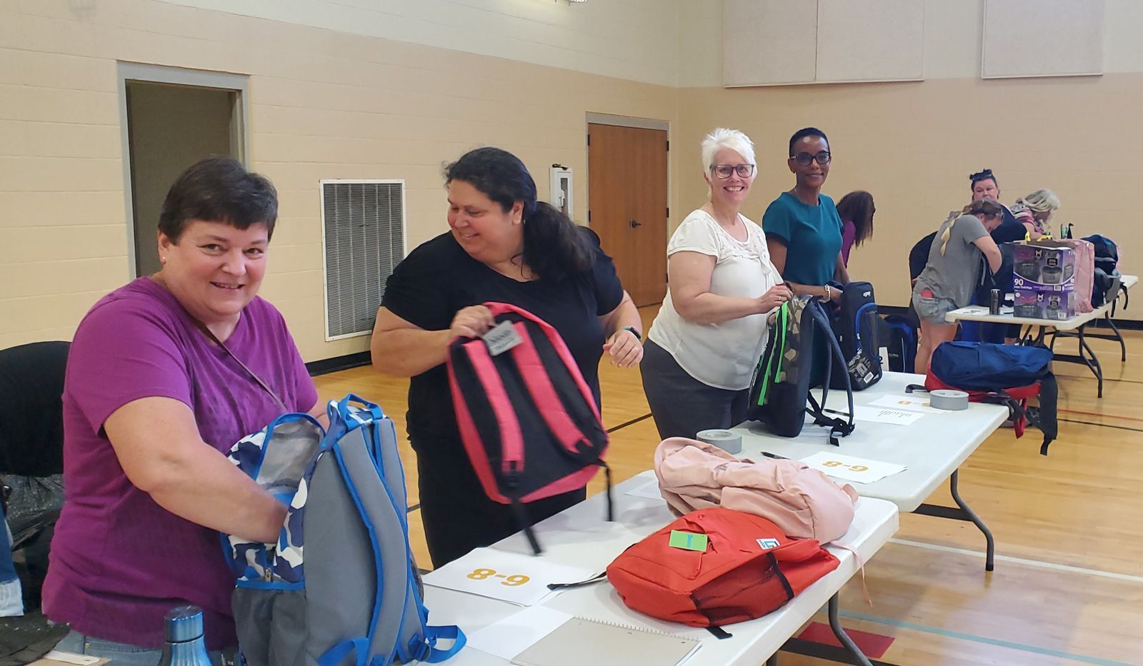 Stuff the Backpacks Event : Take Action : Visionary Youth