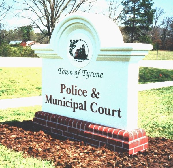 City and village welcome, entrance and wayfinding signs.