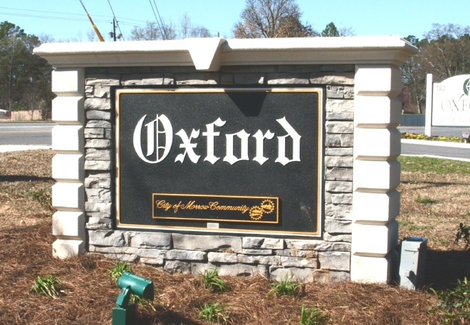 City and village welcome, entrance and wayfinding signs.