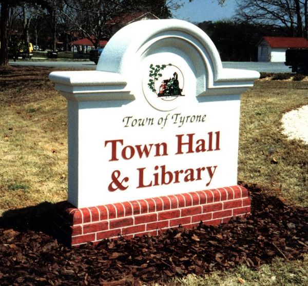 City and village welcome, entrance and wayfinding signs.